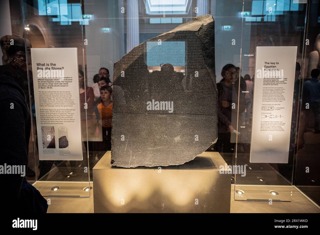 London, UK. 02nd Aug, 2023. Tourists gather round the Rosetta Stone on ...