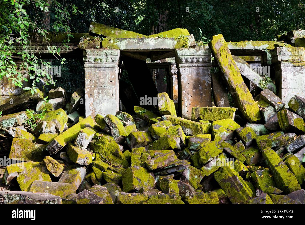 An ancient temple moss covered ruins in Cambodia, Siem Reap province ...