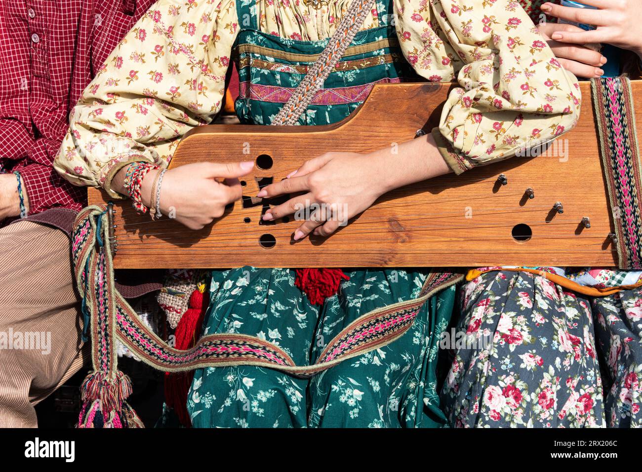 Woman plays an ancient traditional Russian musical instrument - gusli ...