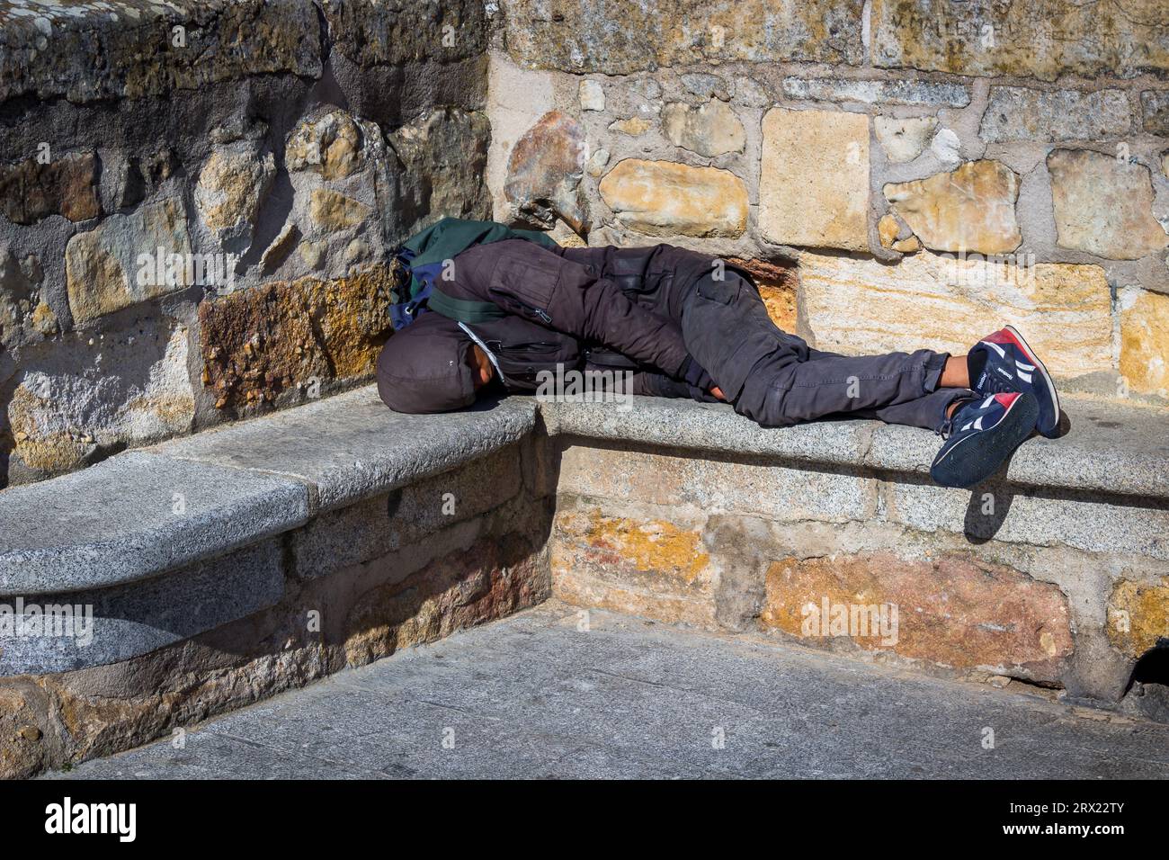 Youth sleeping out on street Stock Photo - Alamy