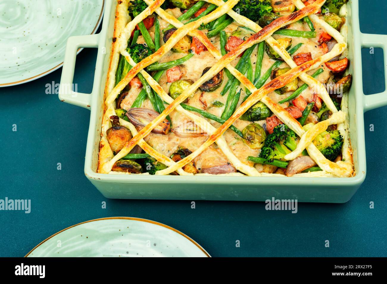 Homemade pie with Brussels sprouts and broccoli stuffed with meat. Puff ...