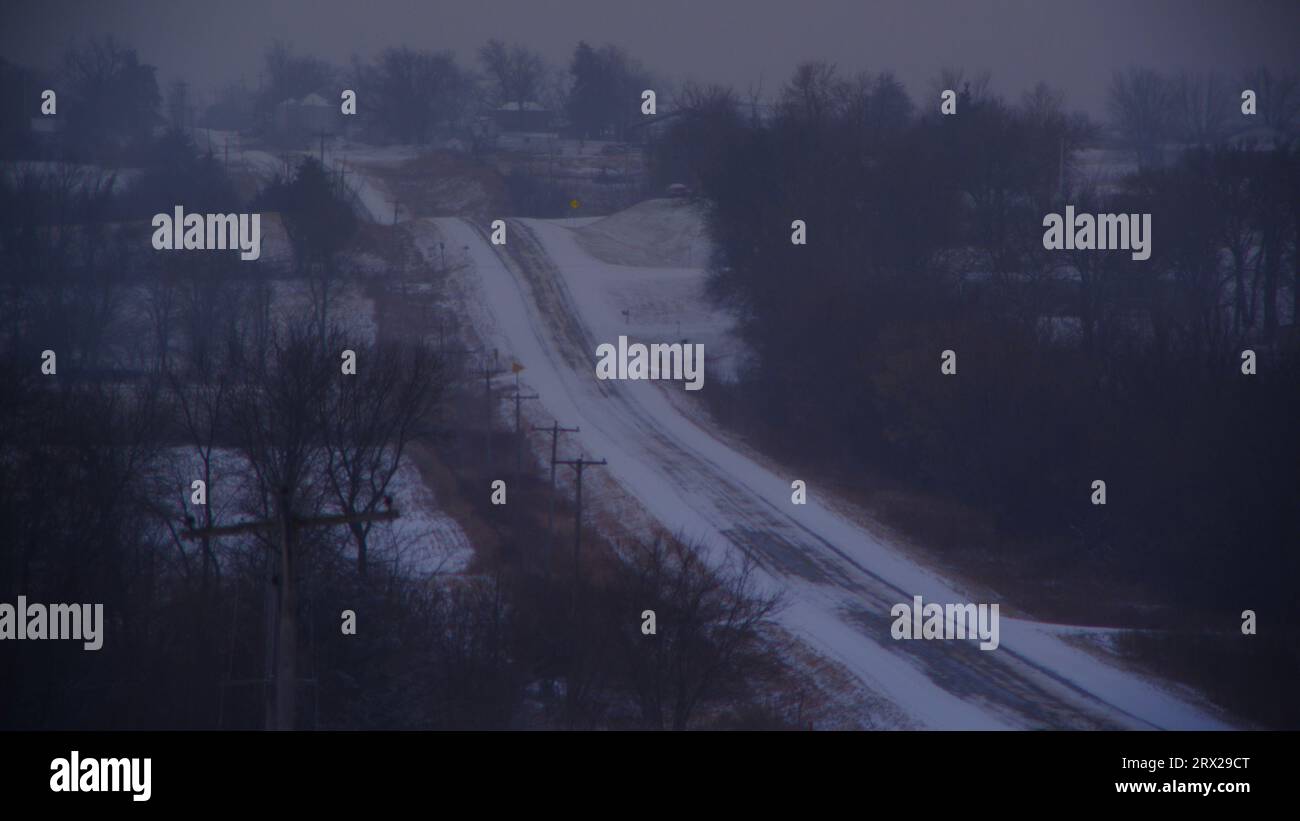 A harsh and dangerous winter blizzard in the hill-country of rural Iowa ...