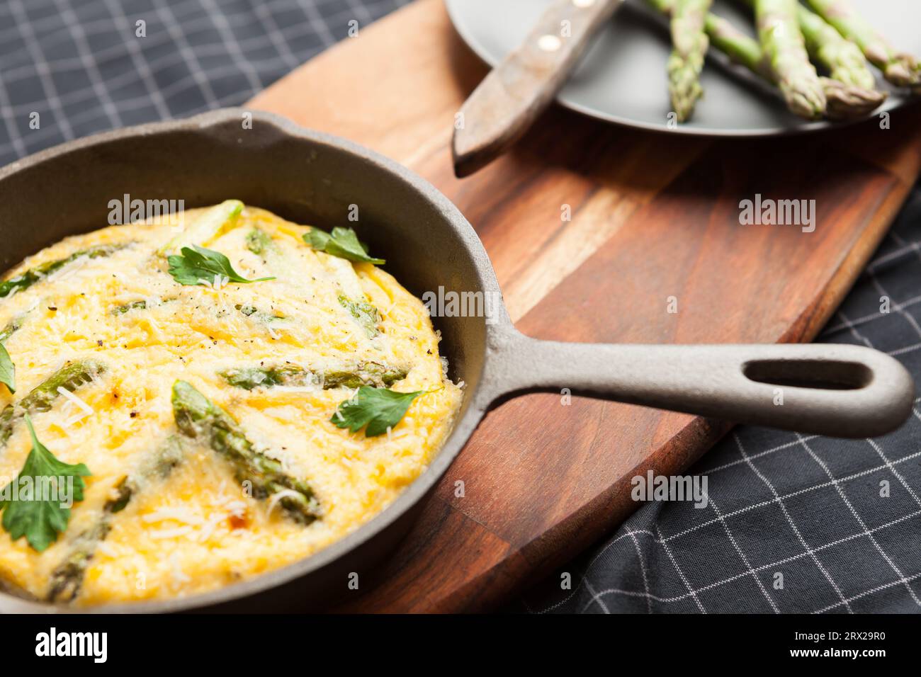 Asparagus frittata with Parma cheese. Spanish dish Stock Photo - Alamy