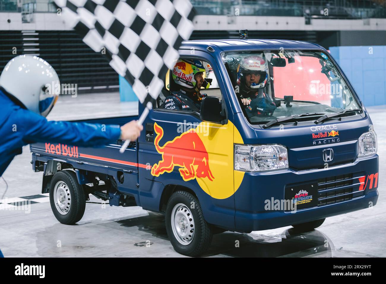 Oracle Red Bull Racing and Scuderia AlphaTauri drivers stopped at Tokyo's Ariake Stadium ahead ...