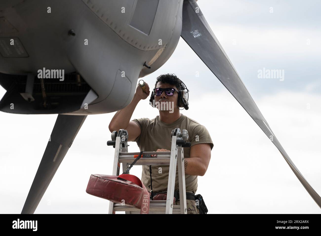 Airman 1st Class Zachary Nieto conducts a postflight inspection at ...