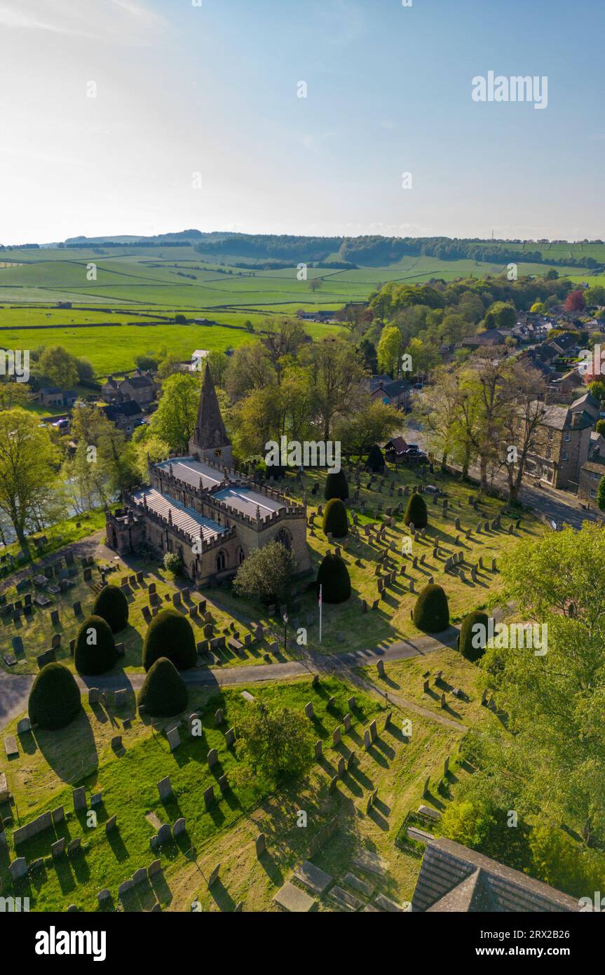 Aerial view of Baslow church and village, Peak District National Park ...