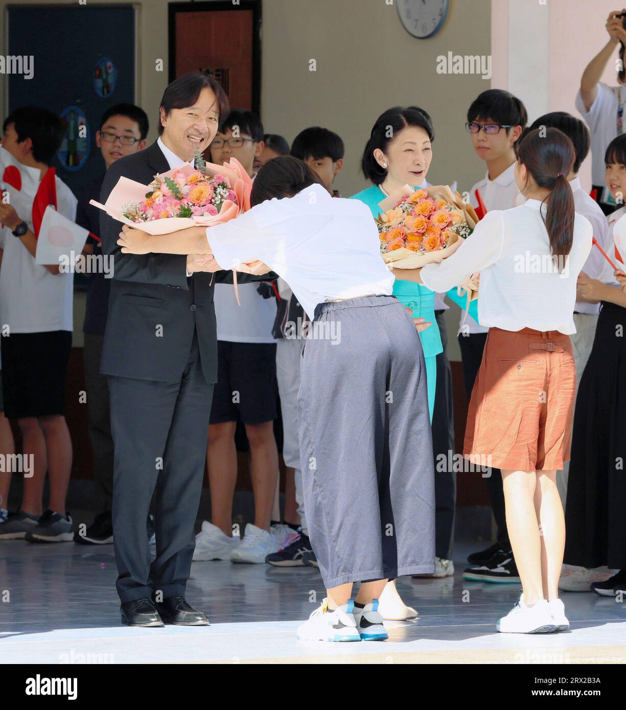 Japanese Crown Prince Fumihito and his wife Crown Princess Kiko visit a Japanese school in Hanoi ...