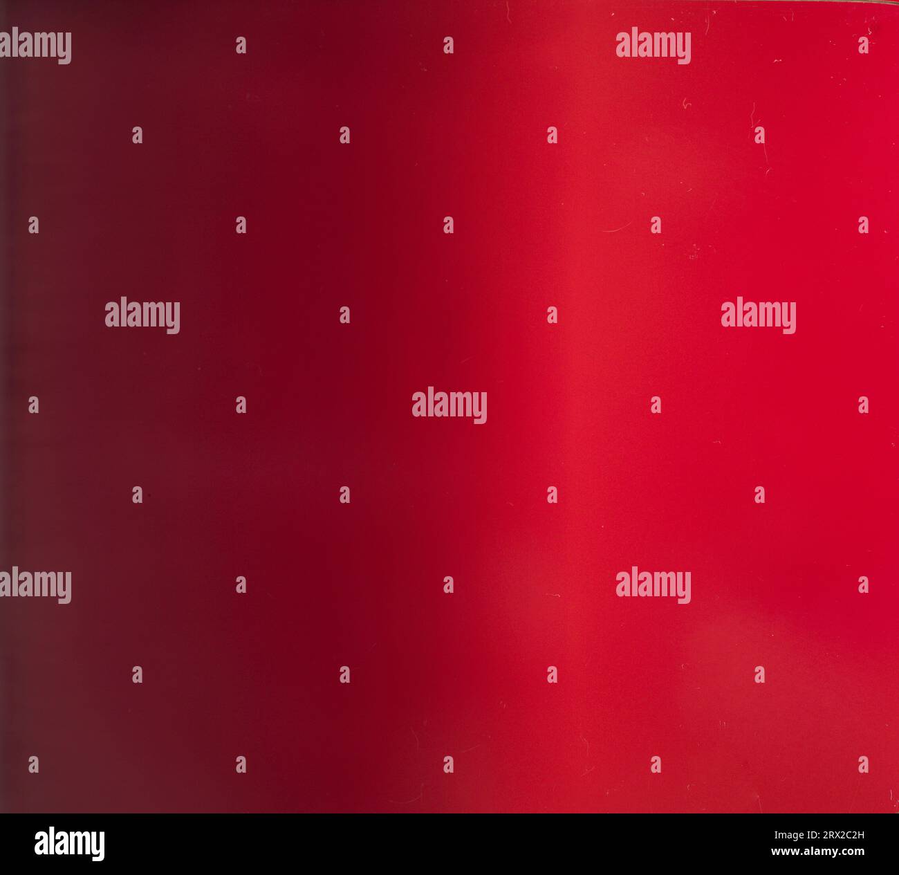 Red solid color background with light pattern as photo Stock Photo - Alamy