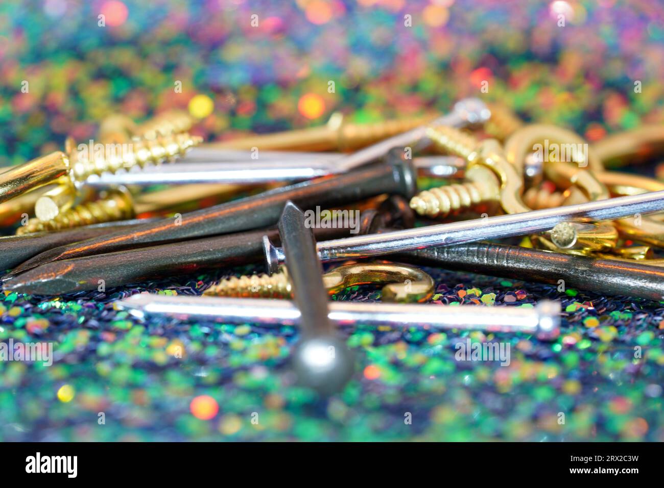 A colorful mix of nails and screws with eyelets and hoes Stock Photo ...