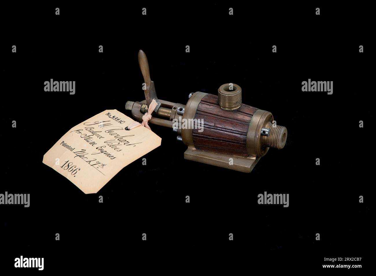 Patent model. Balance valve for steam engine, Carhart, patent no. 53410 ...