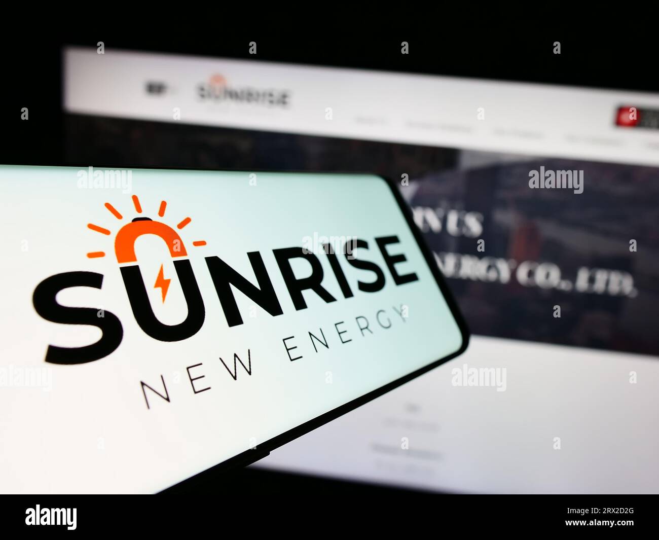 Smartphone with logo of Chinese company Sunrise New Energy Co. Ltd. on ...