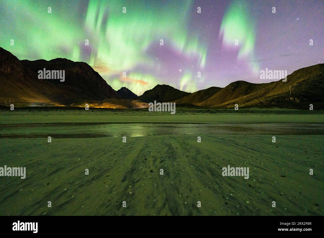 Starry sky with Aurora Borealis (Northern Lights) over the frozen ...