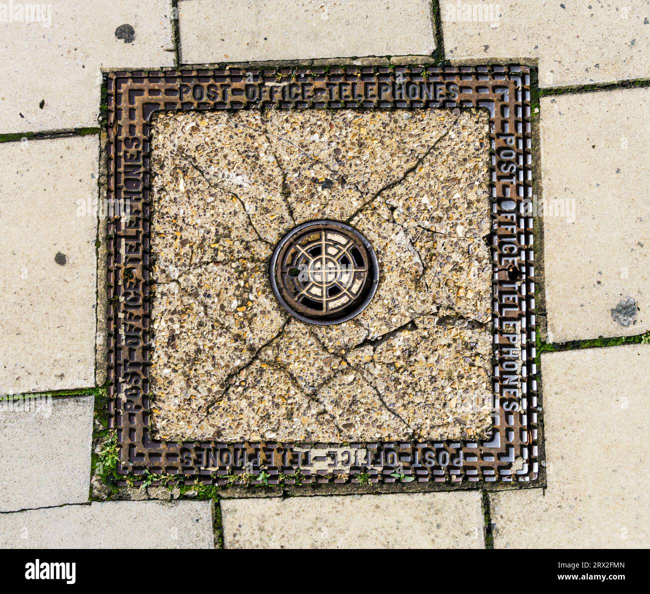 Manhole cover post office telephones hi-res stock photography and ...