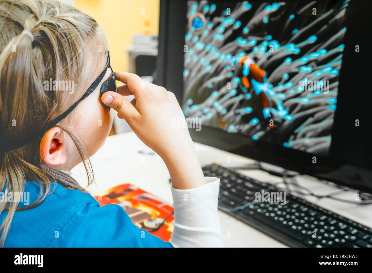 Little girl in medical office undergoing advanced laser vision ...