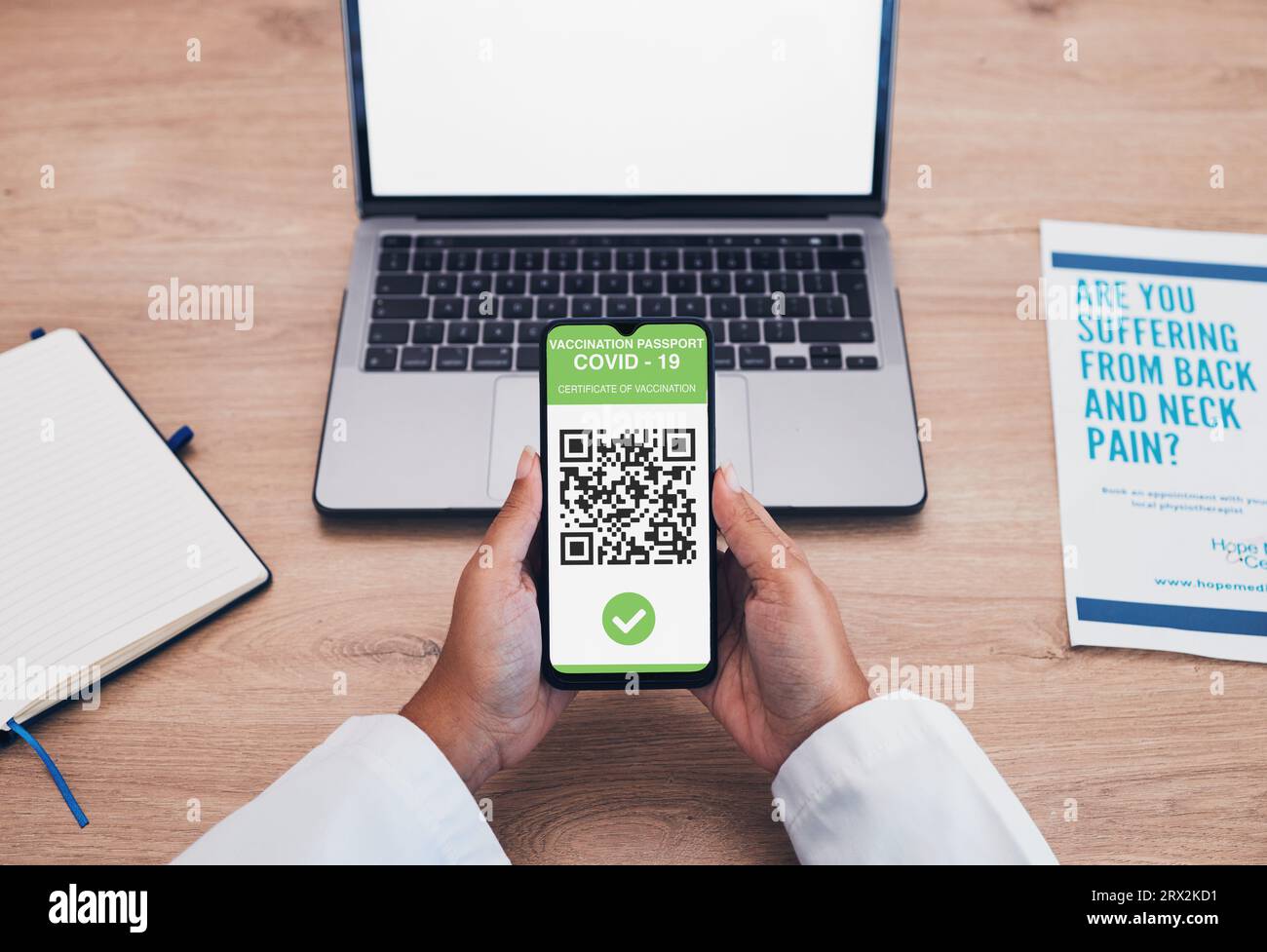 Doctor, qr code and hands with phone for with covid results and ...