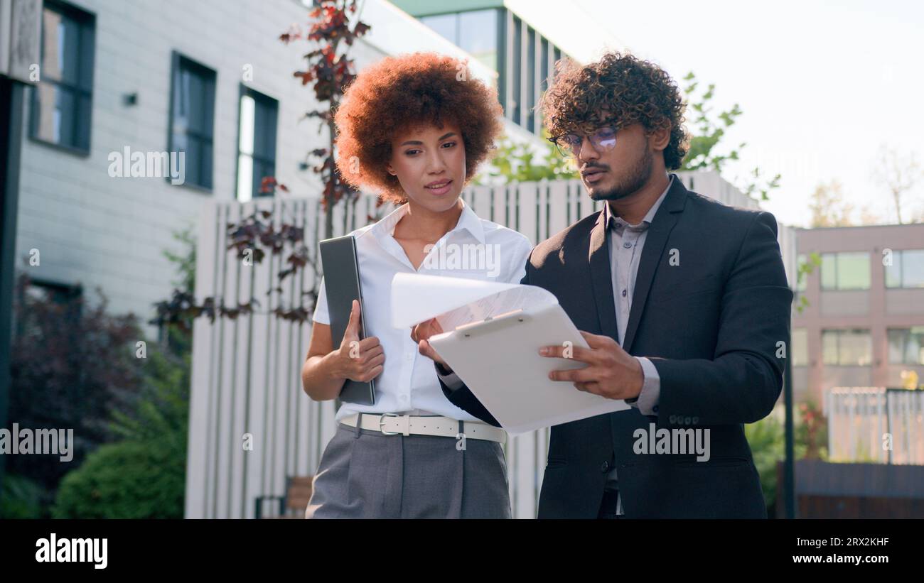 Diverse African American woman businesswoman and Hispanic Indian man ...