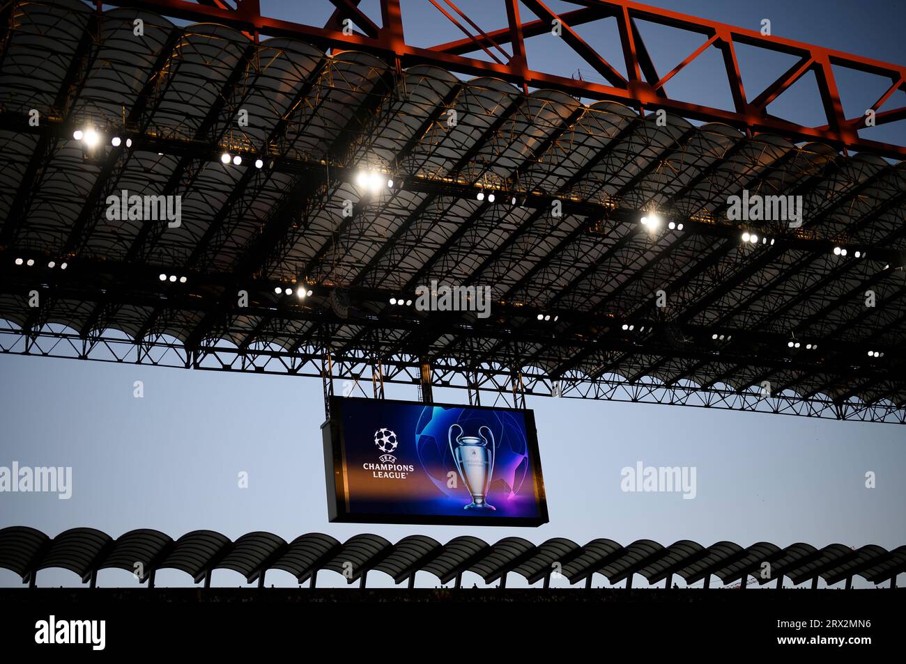 A giant scoreboard displays the logo adn the trophy of UEFA Champions ...