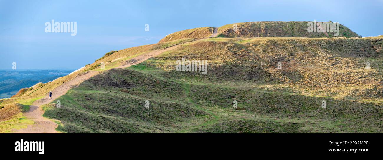 An anonymous human figure ascending the main hill walking pathway ...