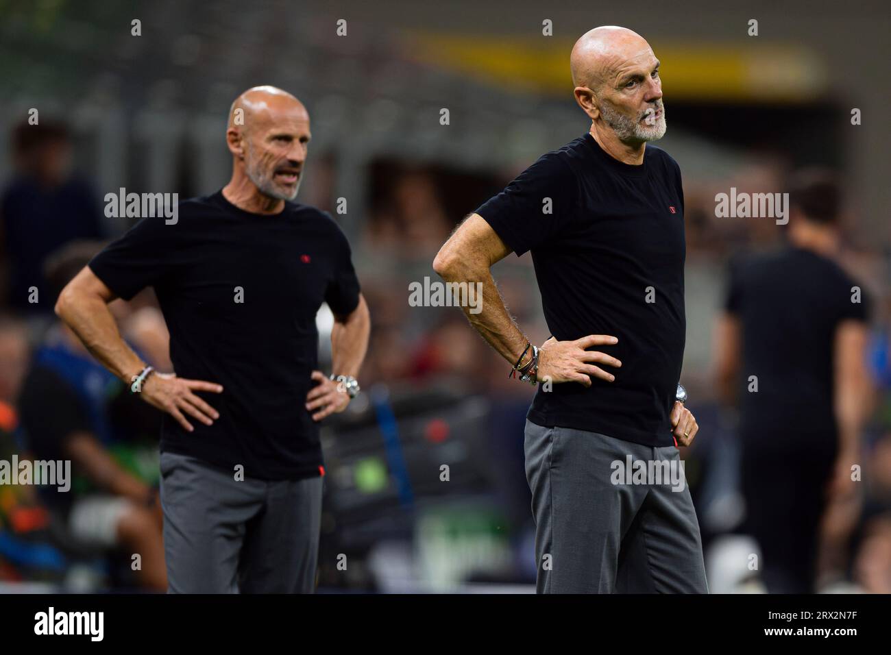 Stefano Pioli, head coach of AC Milan, and Giacomo Murelli look ...