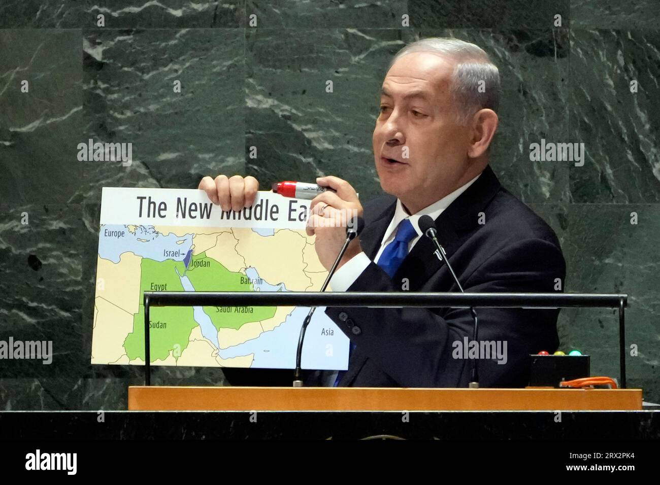 Israel's Prime Minister Benjamin Netanyahu holds his map of "The New ...