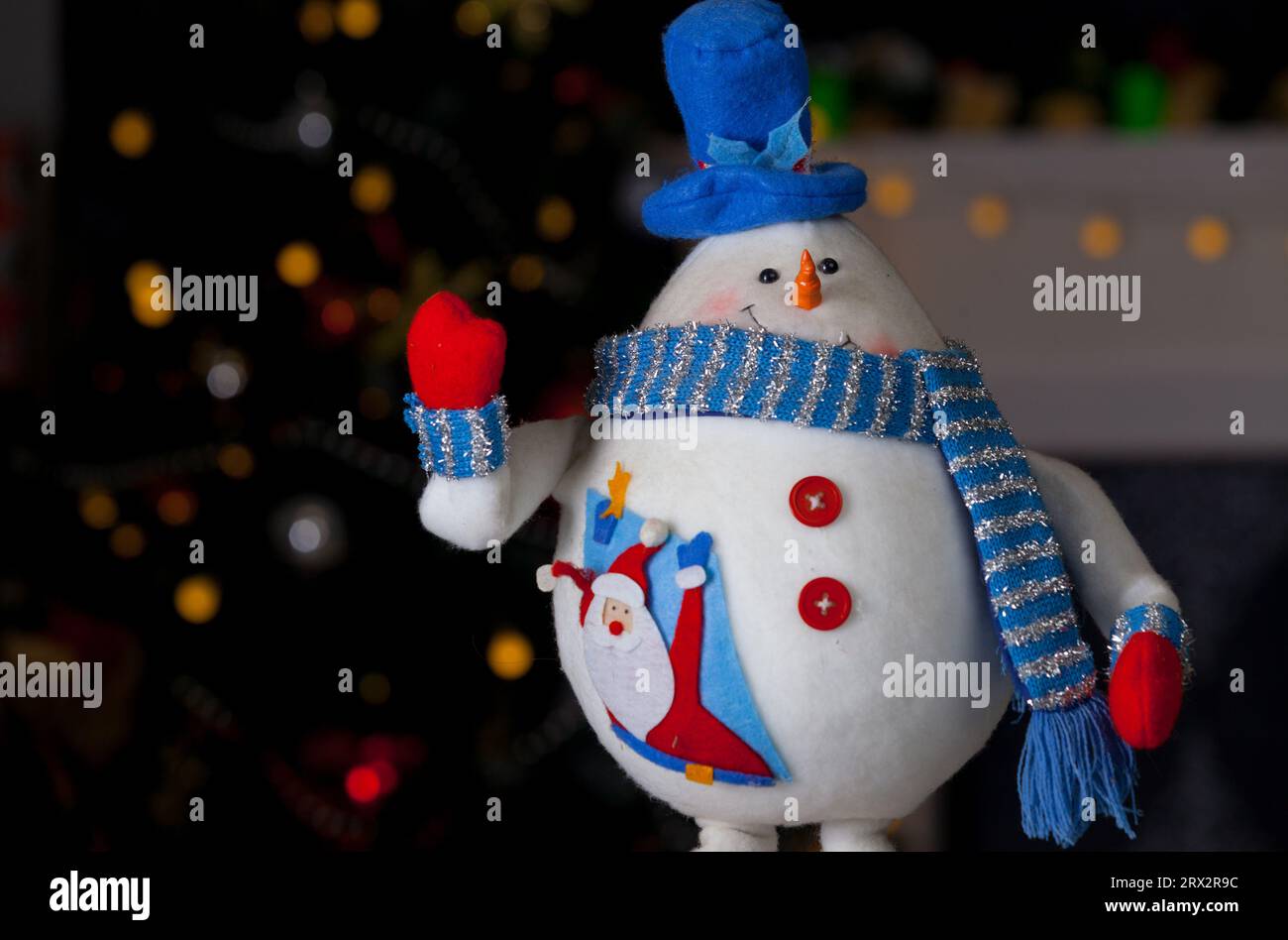 snowman under the tree in a Christmas background Stock Photo - Alamy