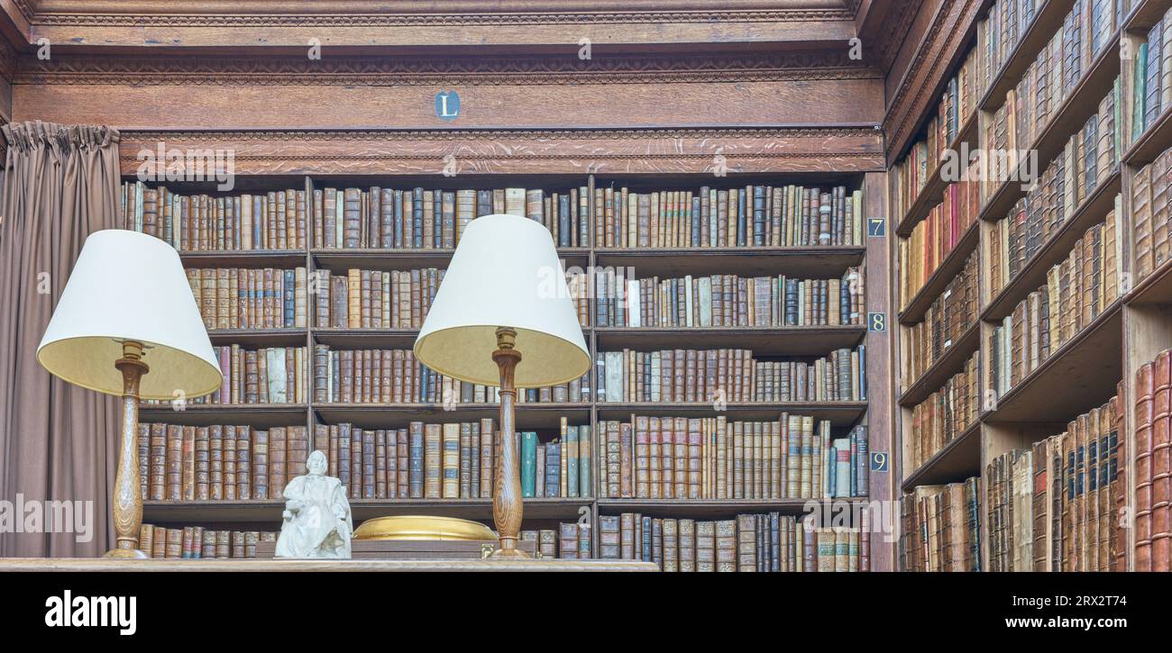 Interior of the Wren library at the prestigious college of Trinity at ...