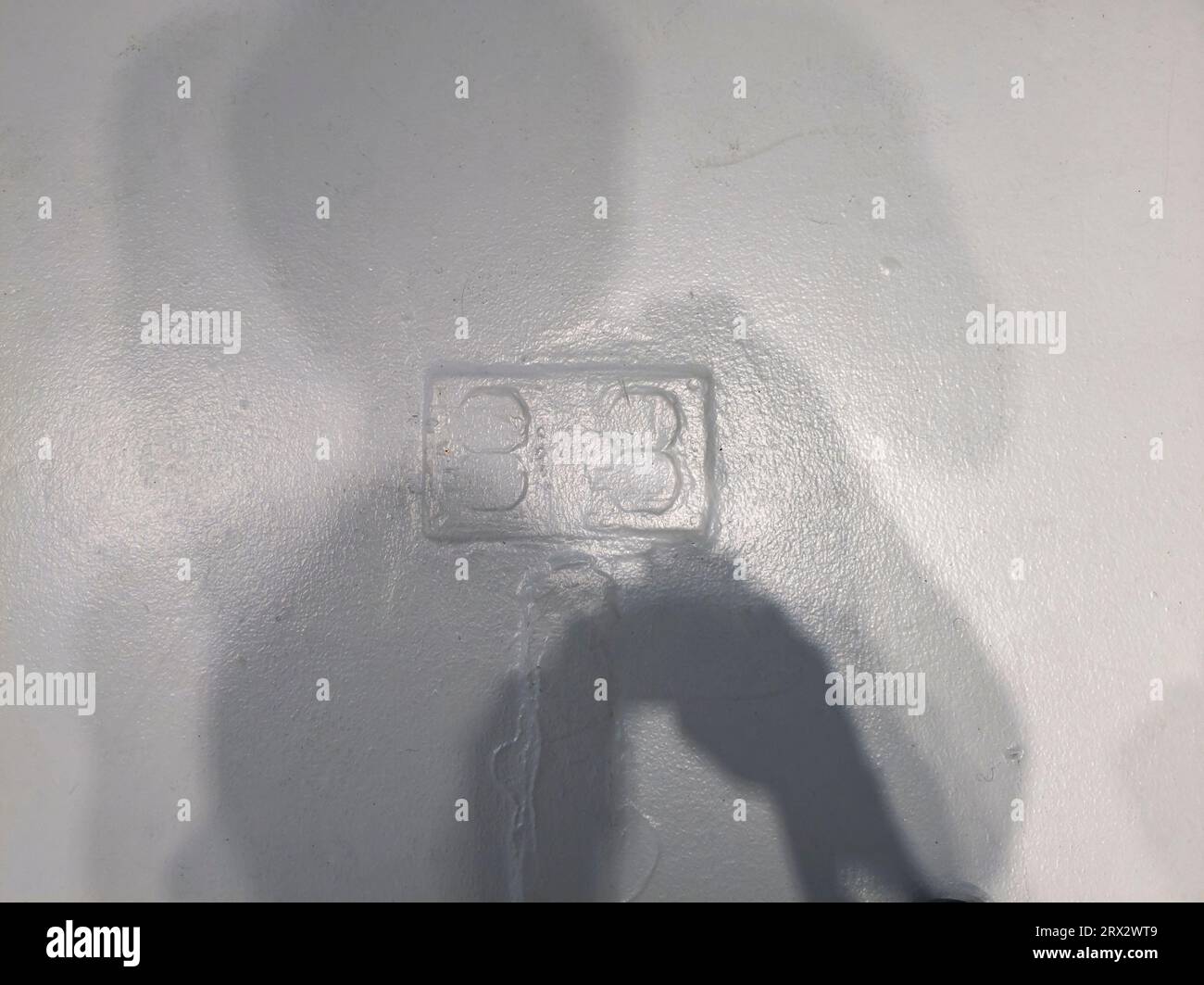 Outlet box covered with epoxy paint on the floor of a gallery in ...