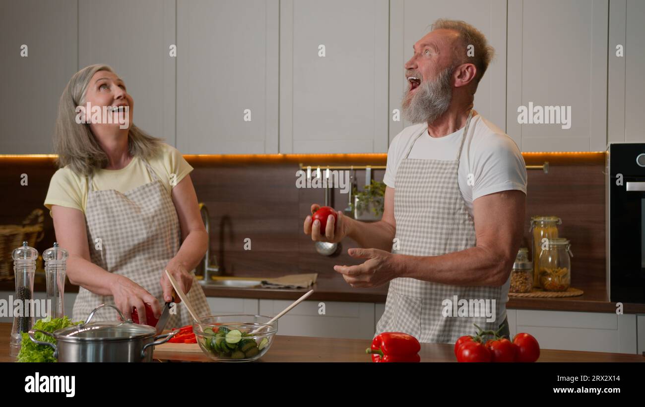 Funny old woman cook hi-res stock photography and images - Alamy