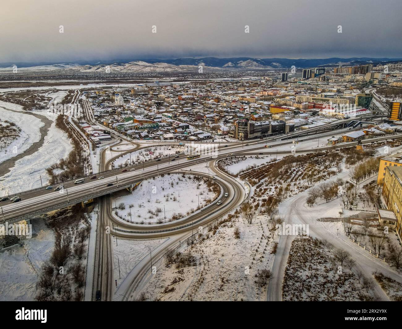 The car bridge and junction over the frozen Selenga river in the ...