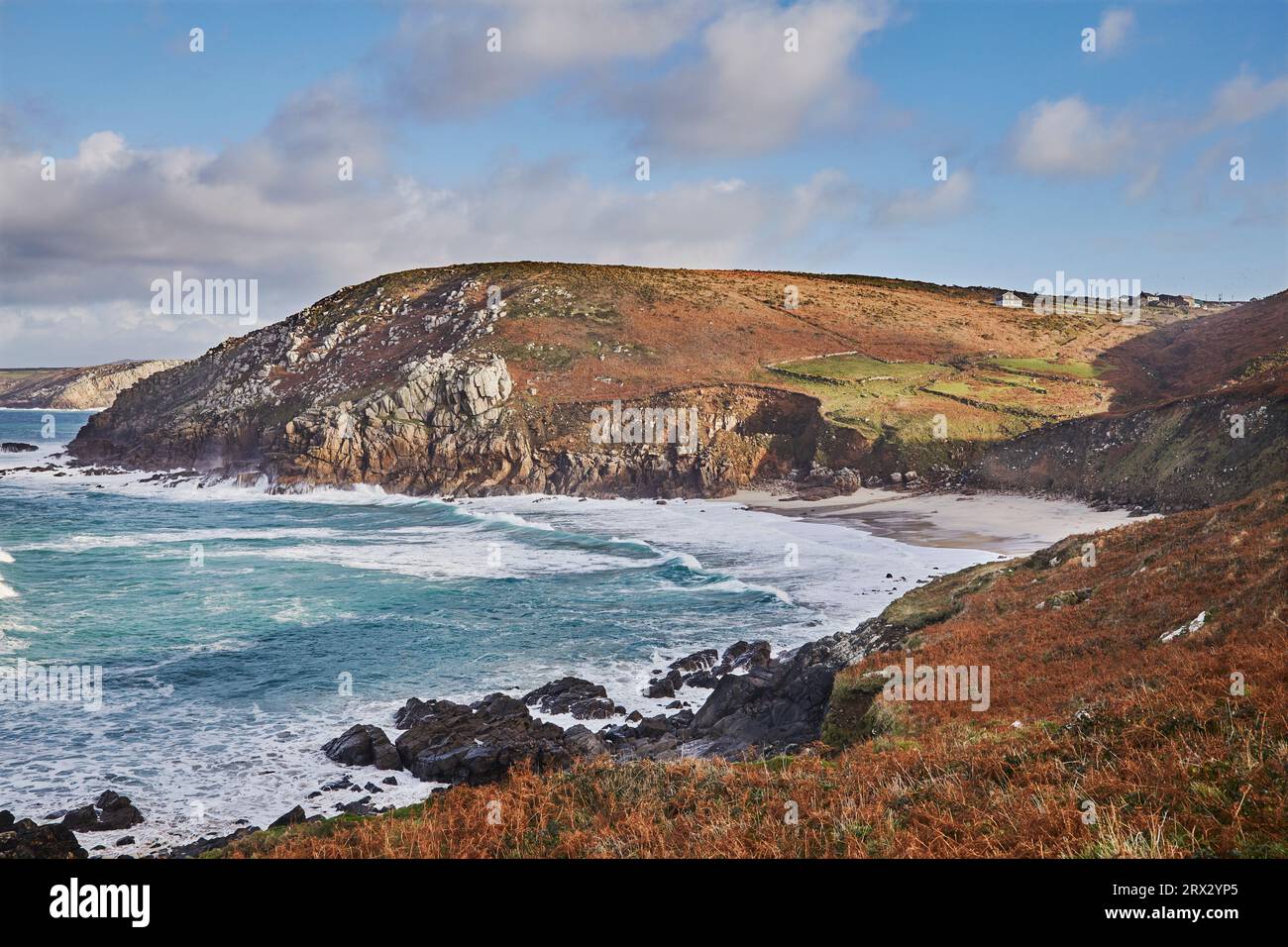 The cliffs and sands of Portheras Cove, a remote beach near Pendeen, on ...