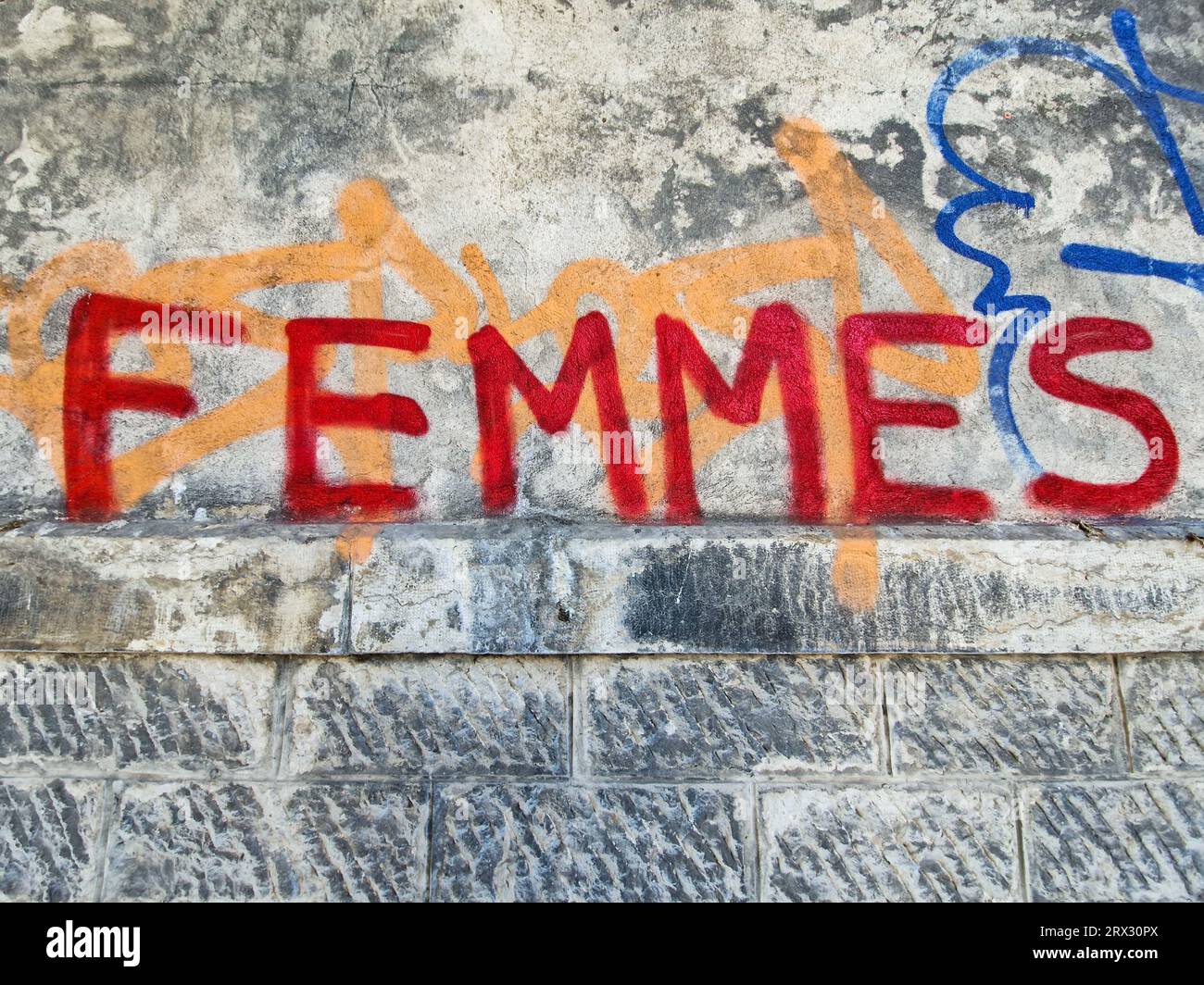 The word WOMEN written on a wall, Lyon, France Stock Photo - Alamy