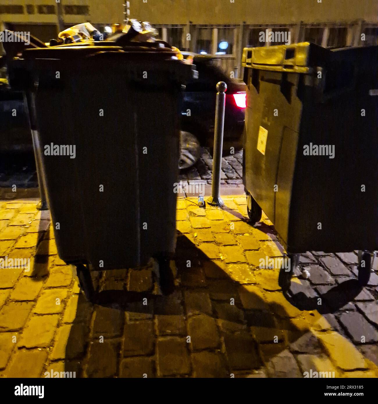 Waste bins at night, Lille, Hauts-de-France, France Stock Photo - Alamy