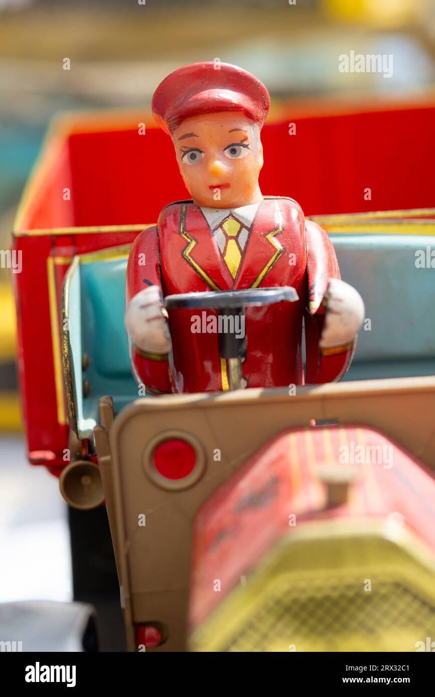 Italy, Lombardy, Flea Market, Old Tin Car Driver Stock Photo - Alamy