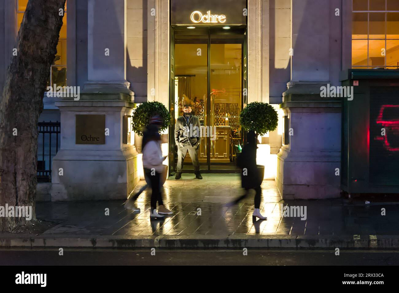 Lit-up entrance to The Ochre located in the National Gallery in the ...