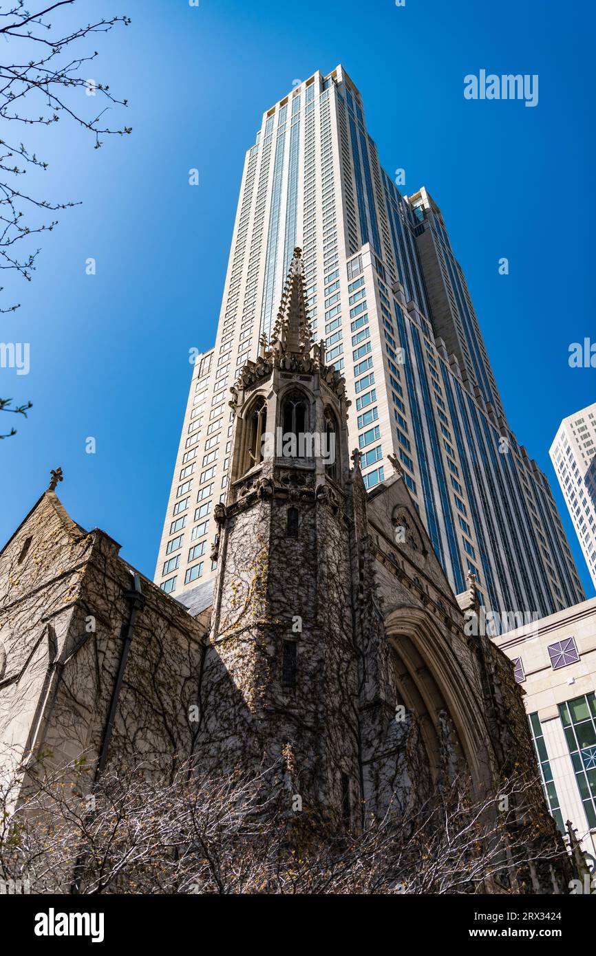 presbyterian church. gothic architecture of church with skyscraper on ...
