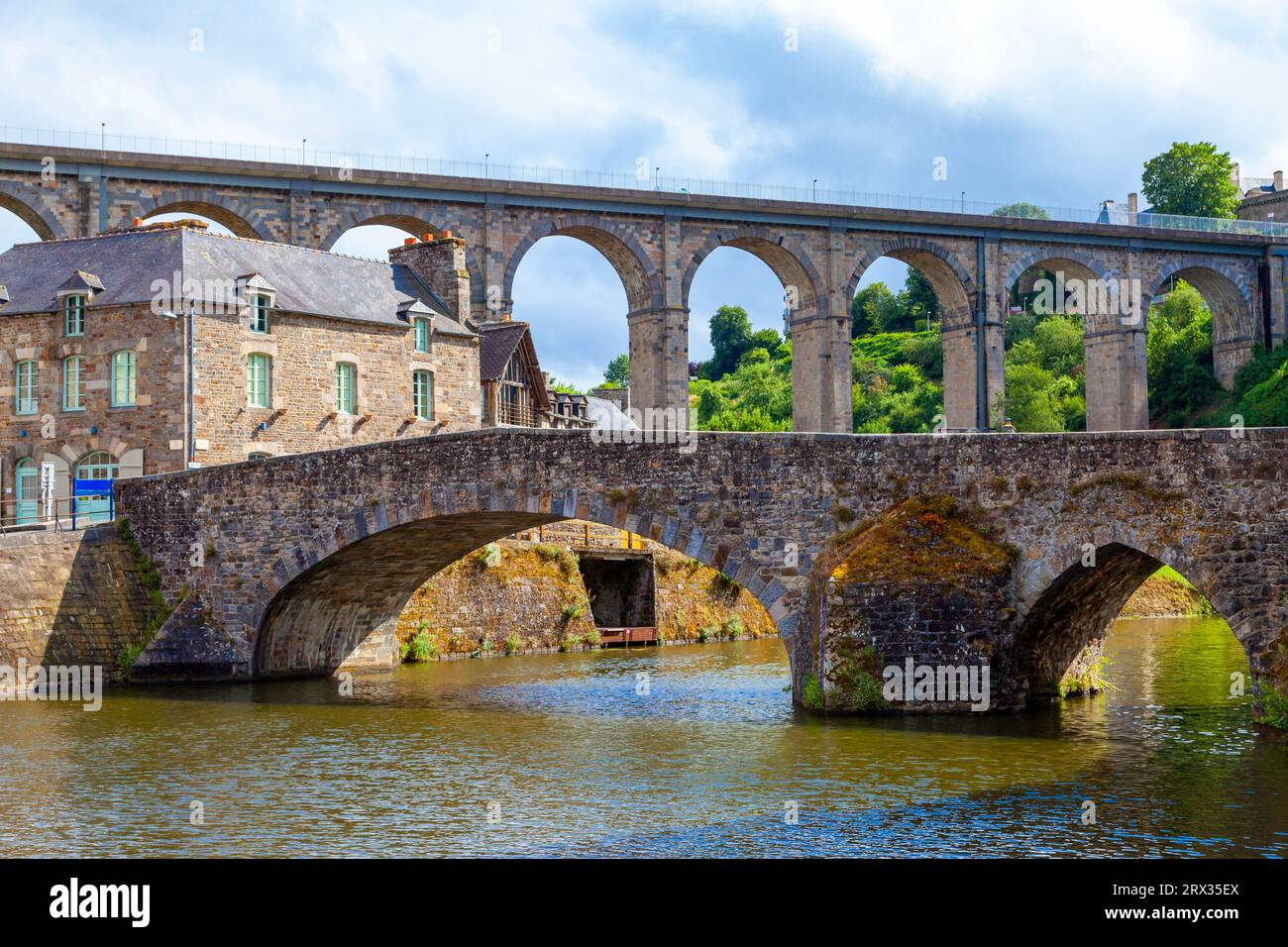 panoramic view of old stone bridge and historical medieval houses ...
