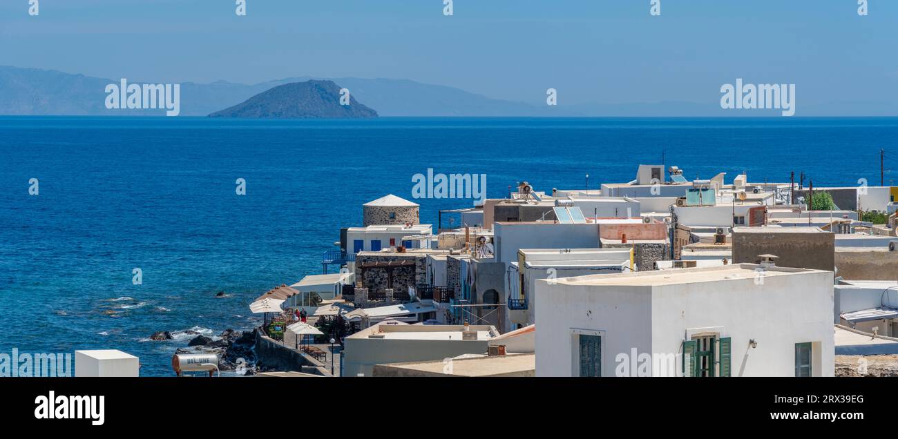 View of sea and whitewashed buildings and rooftops of Mandraki ...