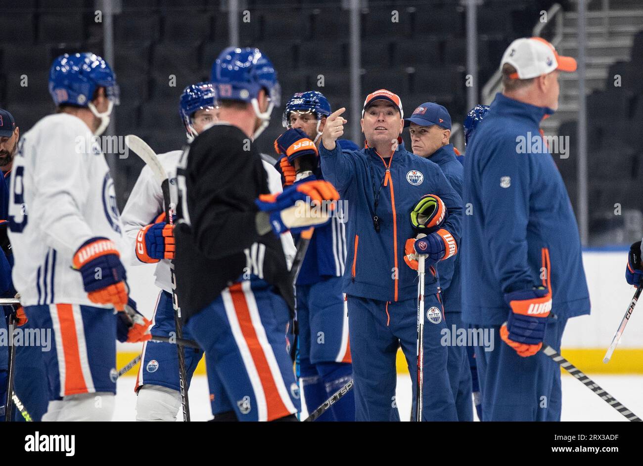 Edmonton Oilers head coach Jay Woodcroft talks with players during NHL ...
