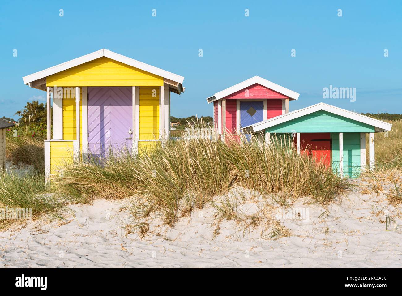 White beach huts in front of dunes hi-res stock photography and images ...