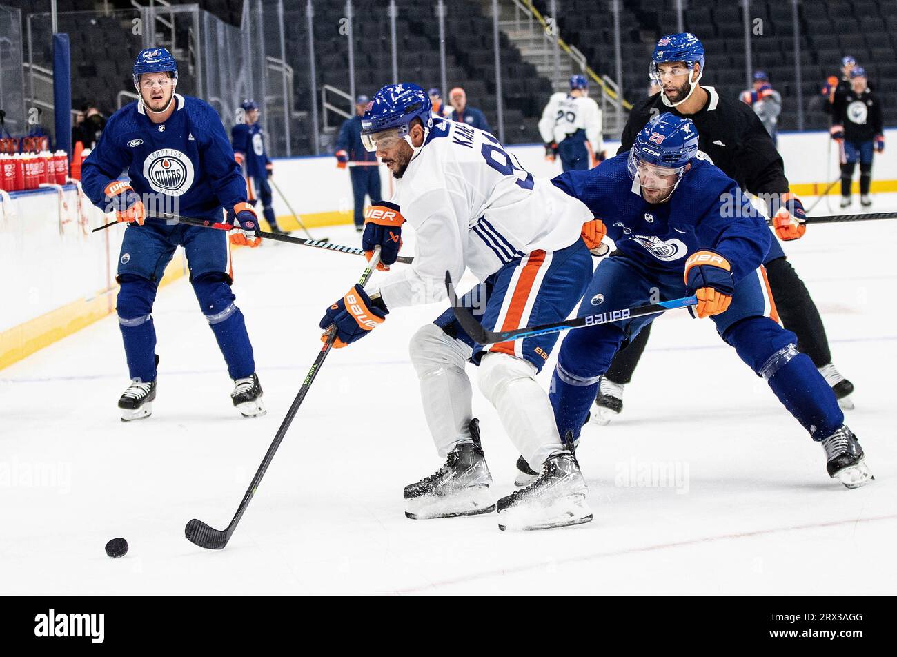 Edmonton Oilers' Evander Kane (91) and Brandon Sutter (20) battle for ...