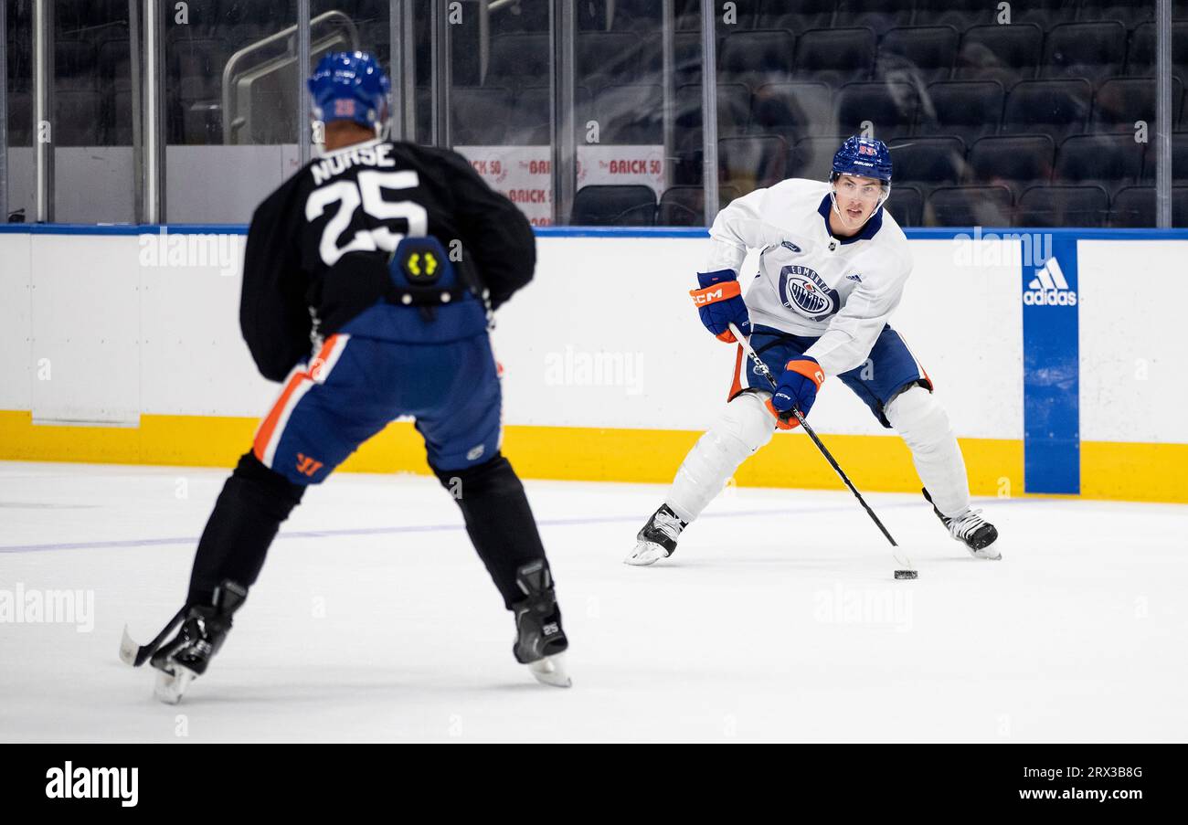 Edmonton Oilers' Darnell Nurse (25) defends against Ryan Nugent-Hopkins ...