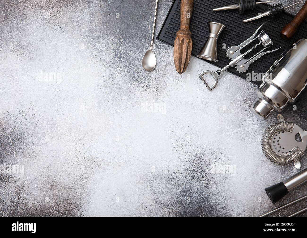Cocktail bar utensils.Jigger,straw and spoon with black shaker,muddler ...