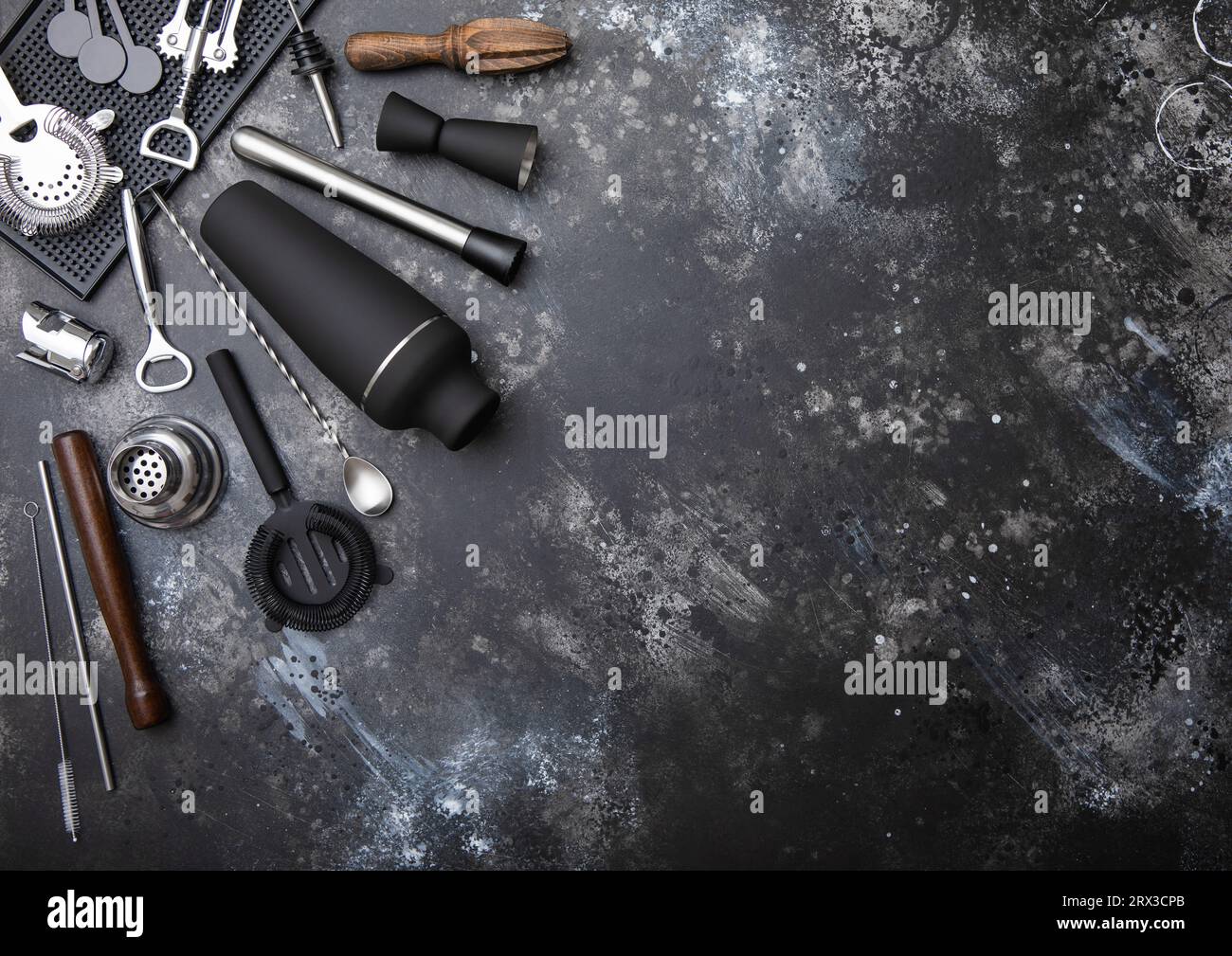 Black matt steel shaker,pourer,spoon,strainer,muddler and jigger on ...