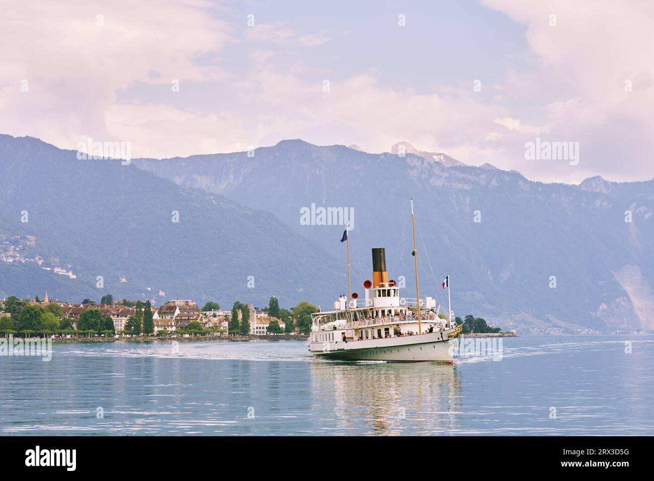 Steam boat with french flag floating on the lake Geneva, Vevey ...
