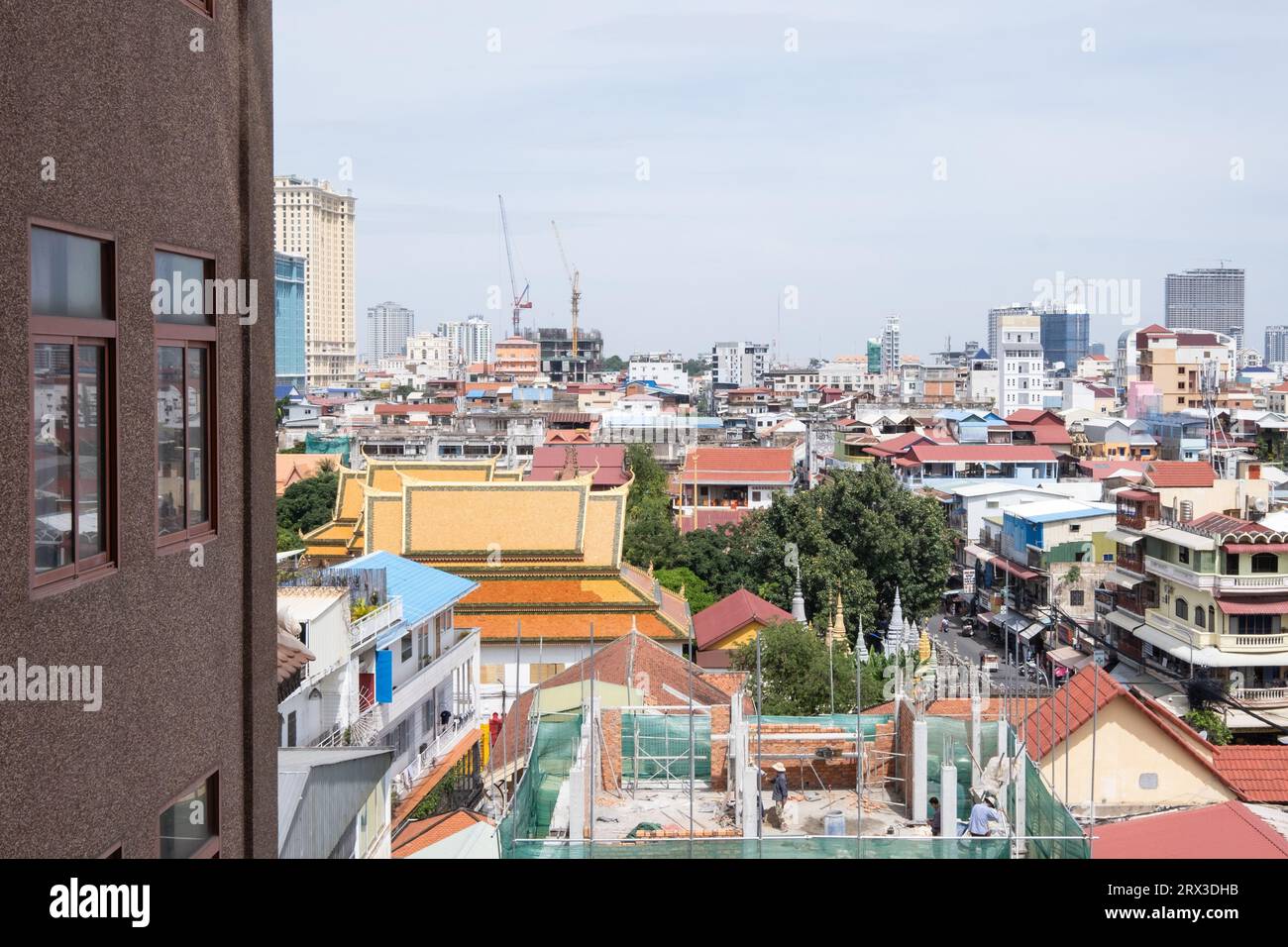 View across Phnom Penh, Cambodia, with a new building being constructed ...