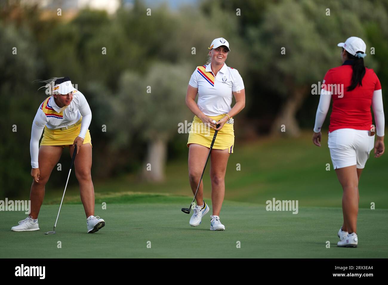 Europe's Emily Pedersen (left) and Maja Stark react on the 18th hole ...