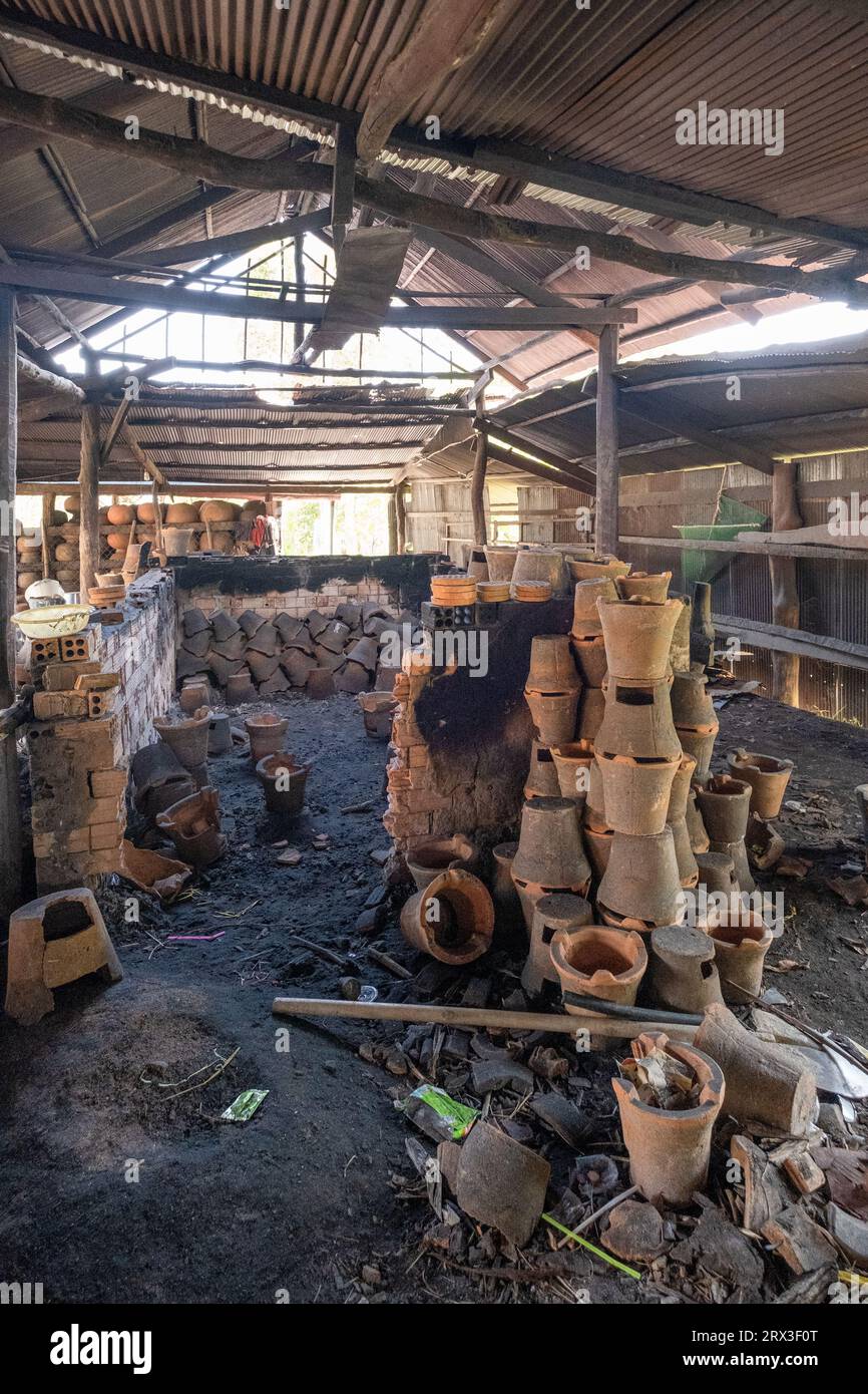 Clay bucket stoves being made by hand in Cambodia Stock Photo - Alamy
