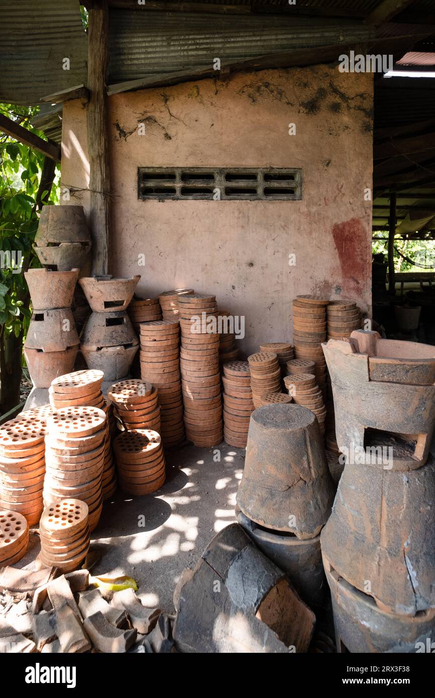 Clay bucket stoves being made by hand in Cambodia Stock Photo - Alamy
