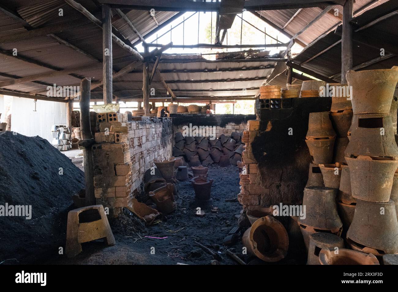 Clay bucket stoves being made by hand in Cambodia Stock Photo - Alamy