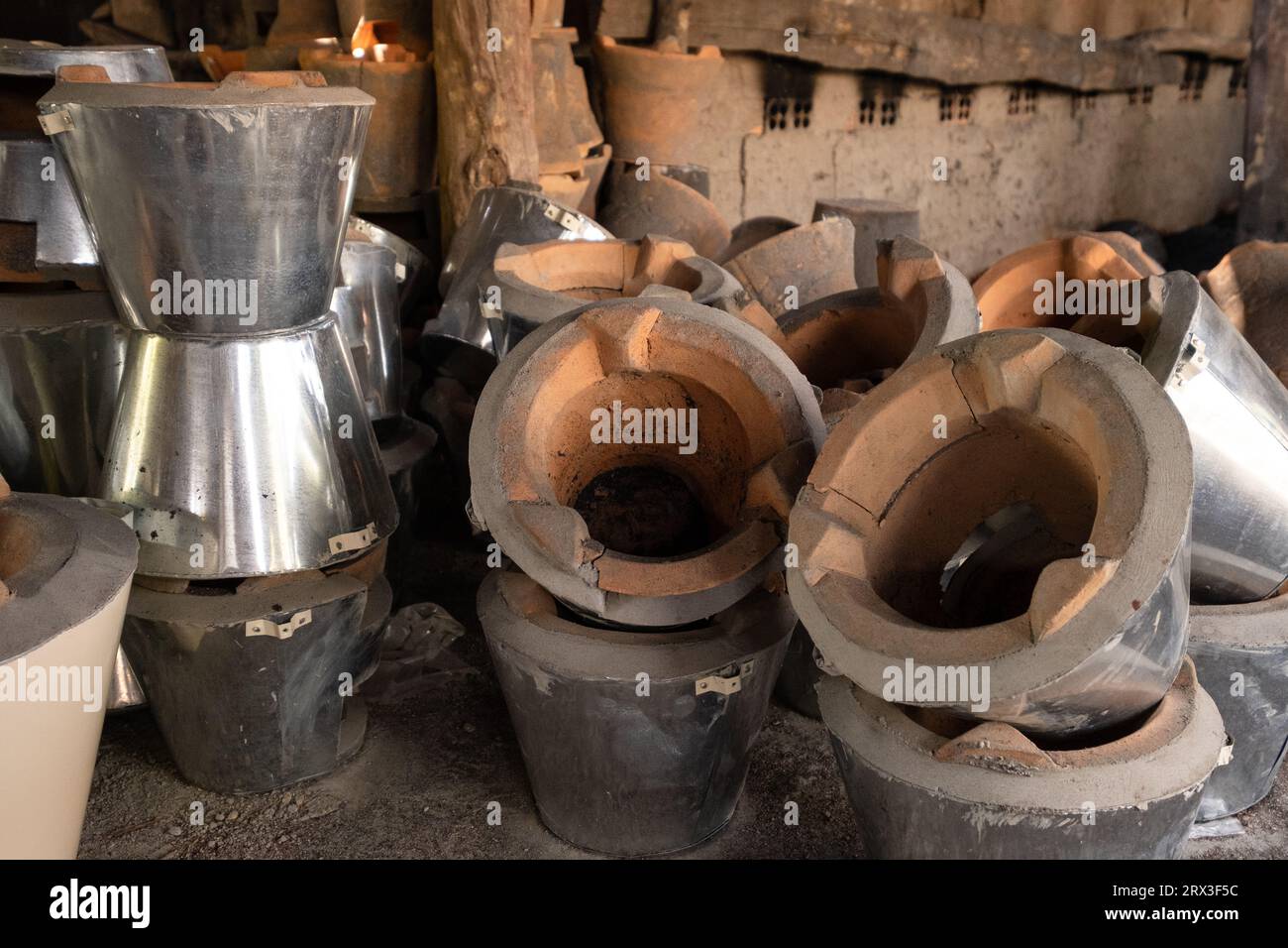 Clay bucket stoves being made by hand in Cambodia Stock Photo - Alamy